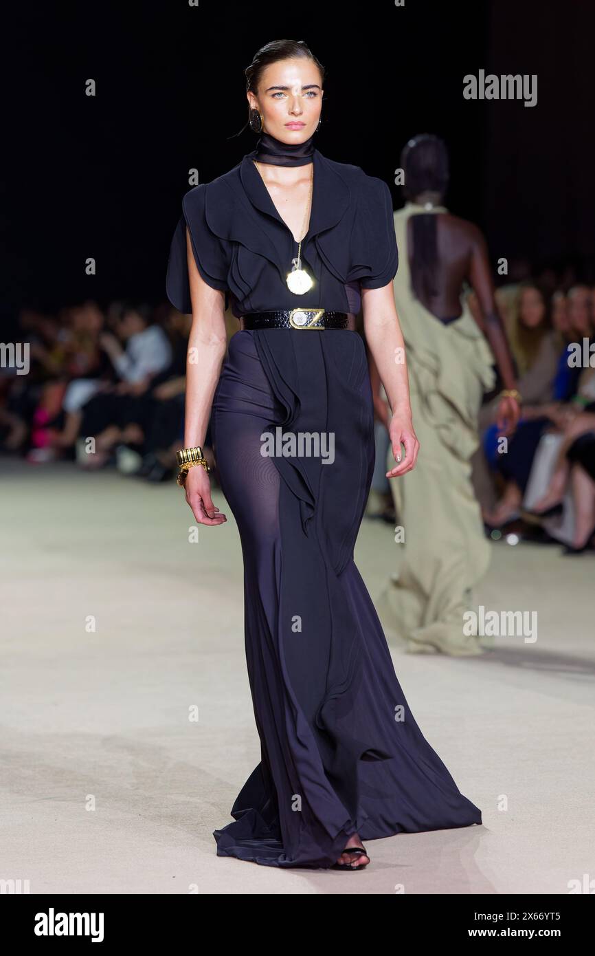 Sydney, Australia. 13th May, 2024. A model walks the runway during the ...