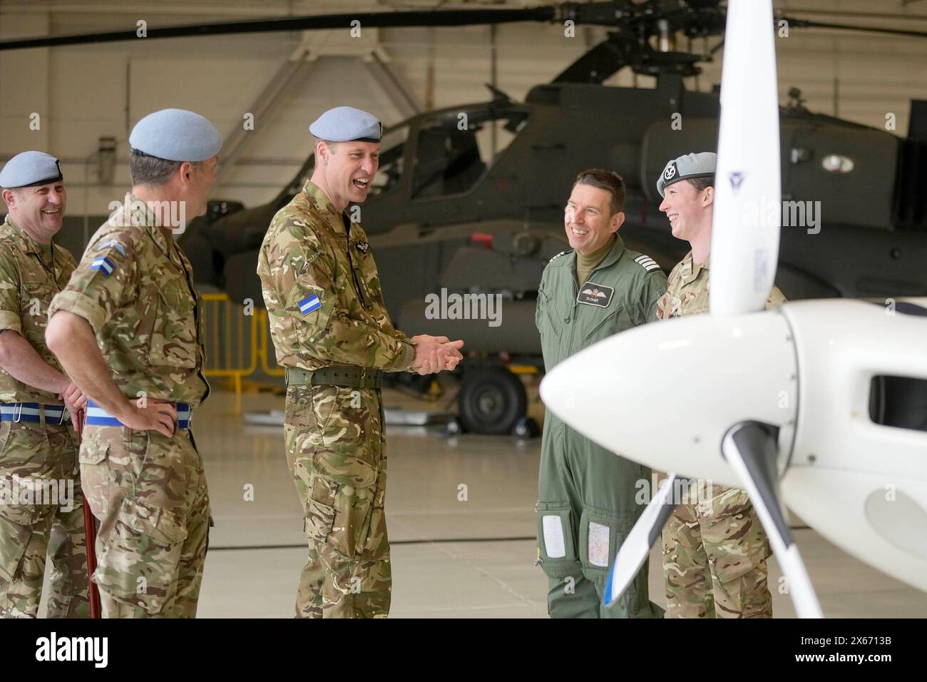 The Prince of Wales (centre) talks with service personnel at the Army ...
