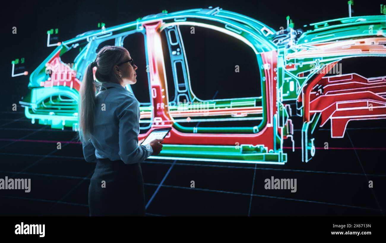 Innovative Green Energy Startup: Female Engineer Designing Electric Car ...