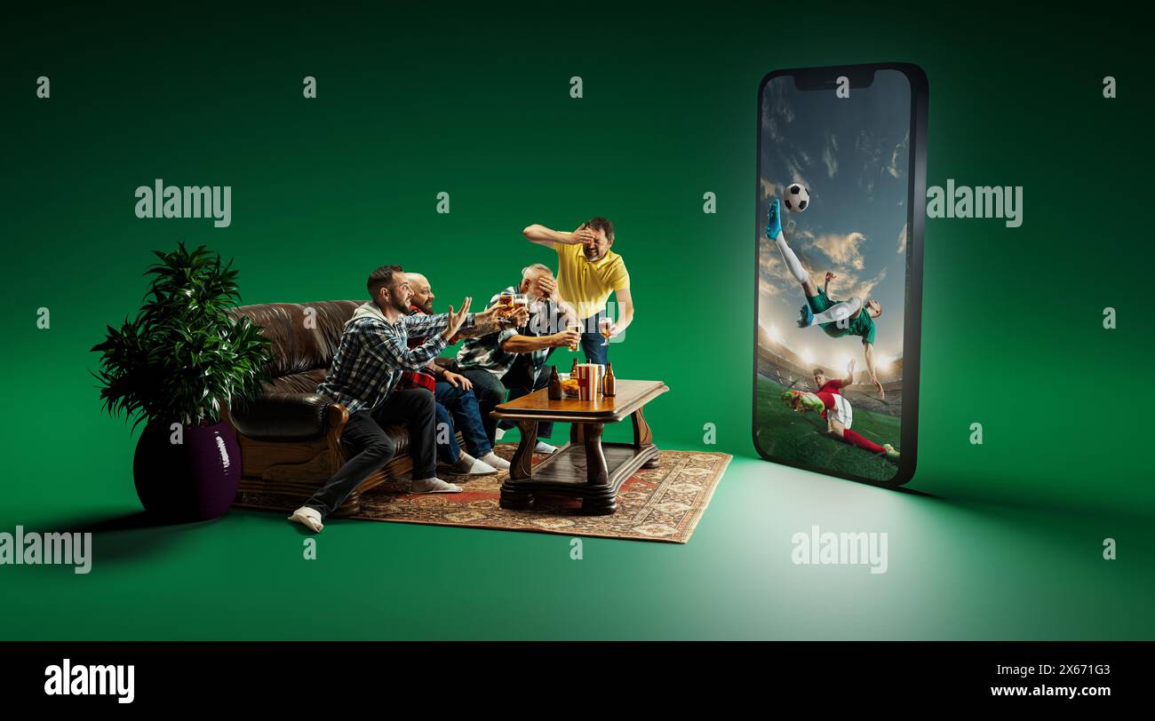 Losing goal. Friends, men sitting on sofa at home and watching football ...