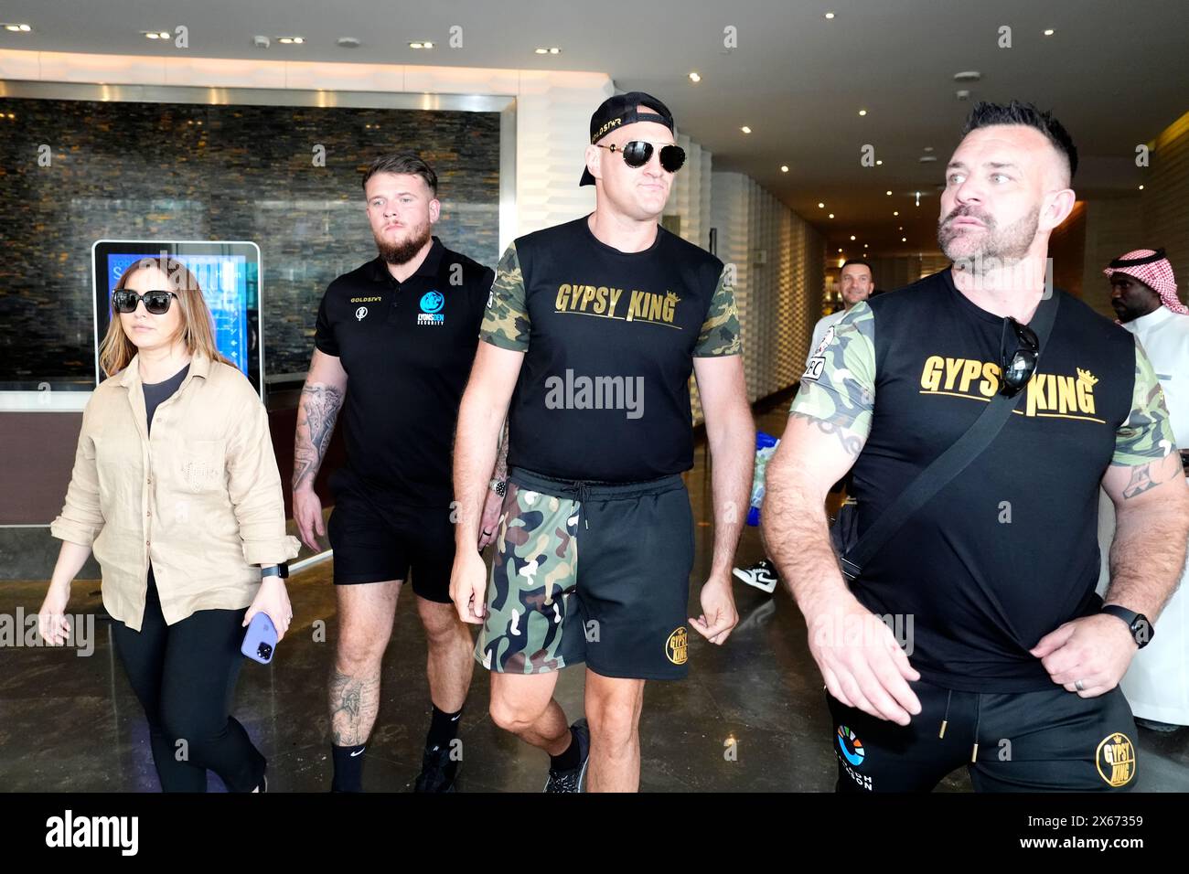 Boxer Tyson Fury (centre) during a media day in Riyadh. The IBF, WBA ...