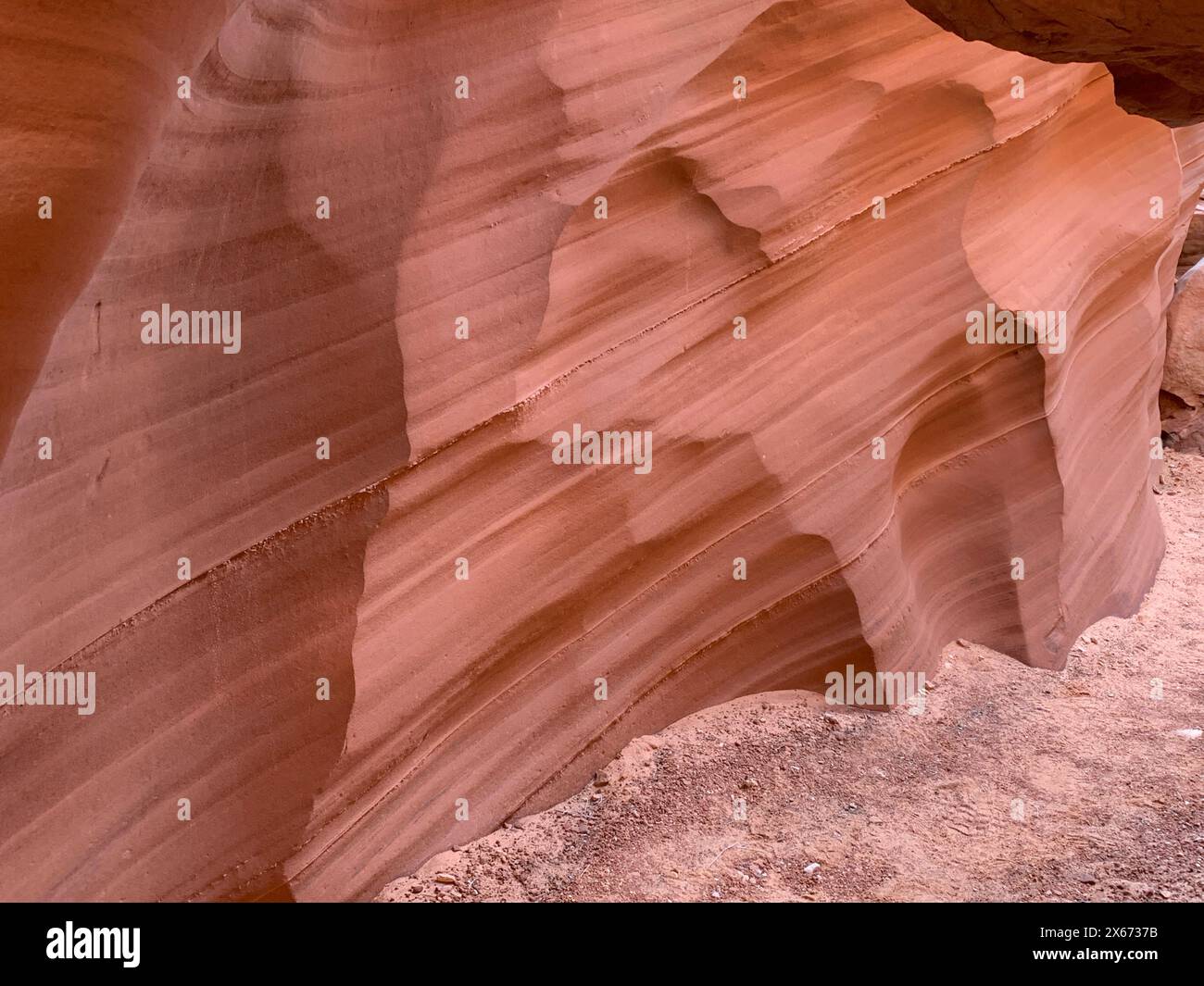 Close up of sandstone walls in Antelope Canyon show the eroded ...
