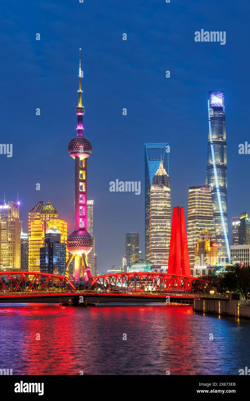 Shanghai skyline at Bund with Oriental Pearl Tower downtown portrait ...