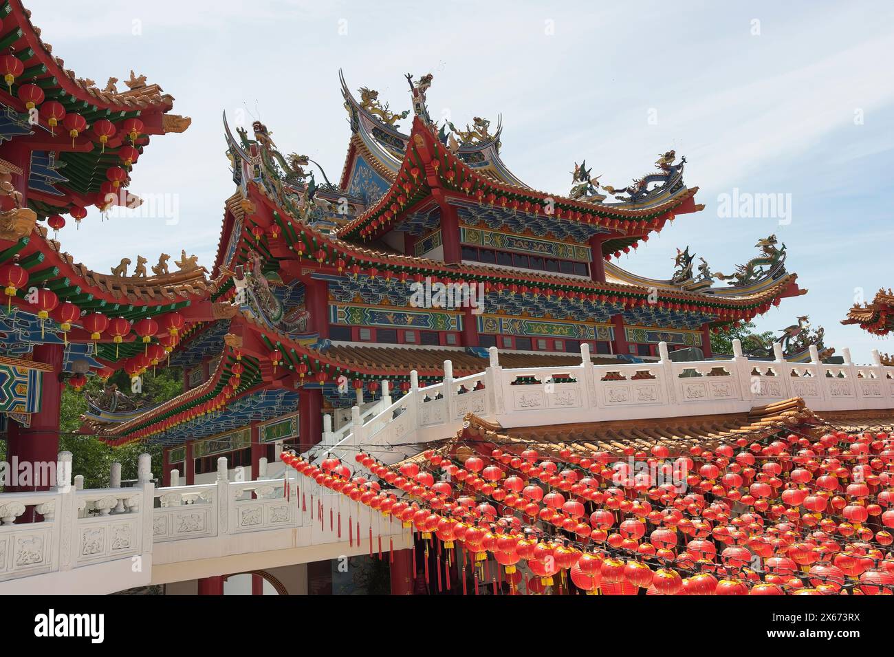 vibrant display of chinese red lanterns at a temple festival. a large ...