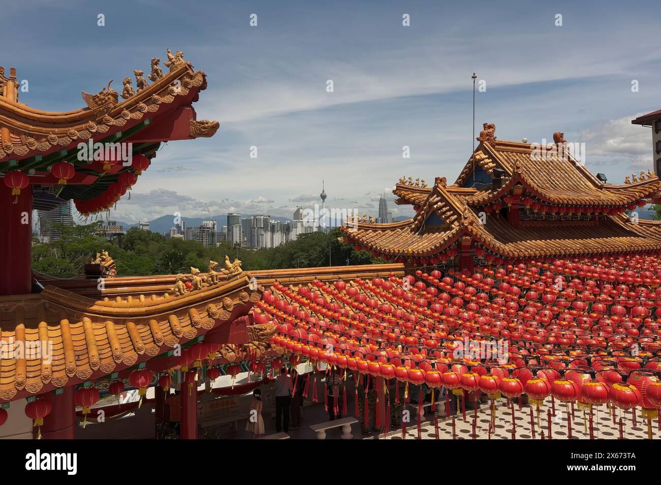 vibrant display of chinese red lanterns at a temple festival. a large ...