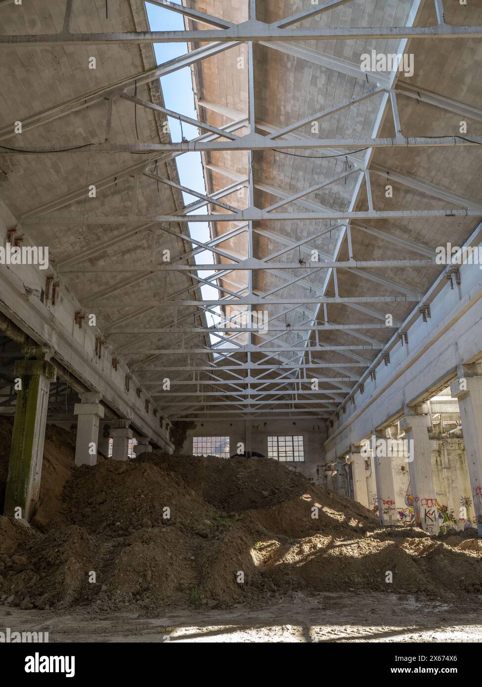 Destroyed and Abandoned interior of Large Mechanical Warehouses with ...