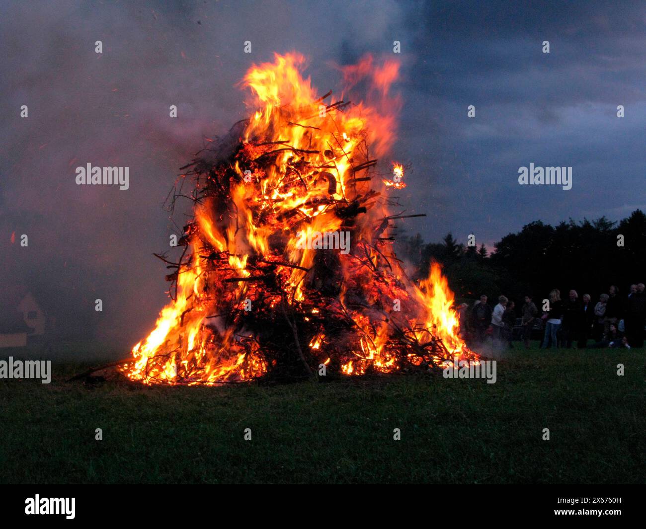 the flames of a burning fire as a heat source the flames of a fire ...