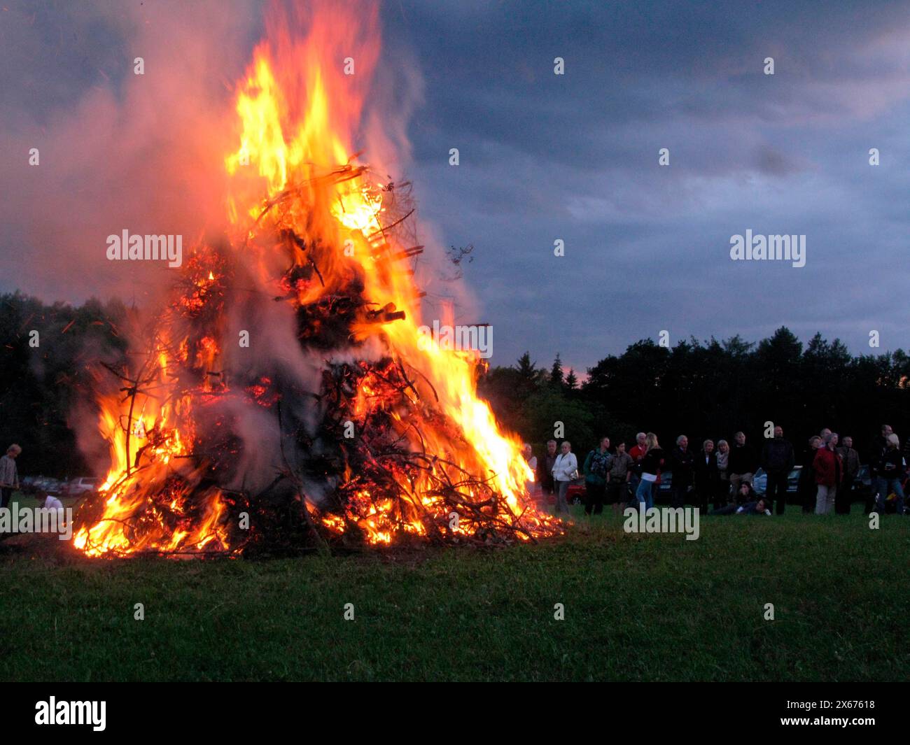 the flames of a burning fire as a heat source the flames of a fire ...