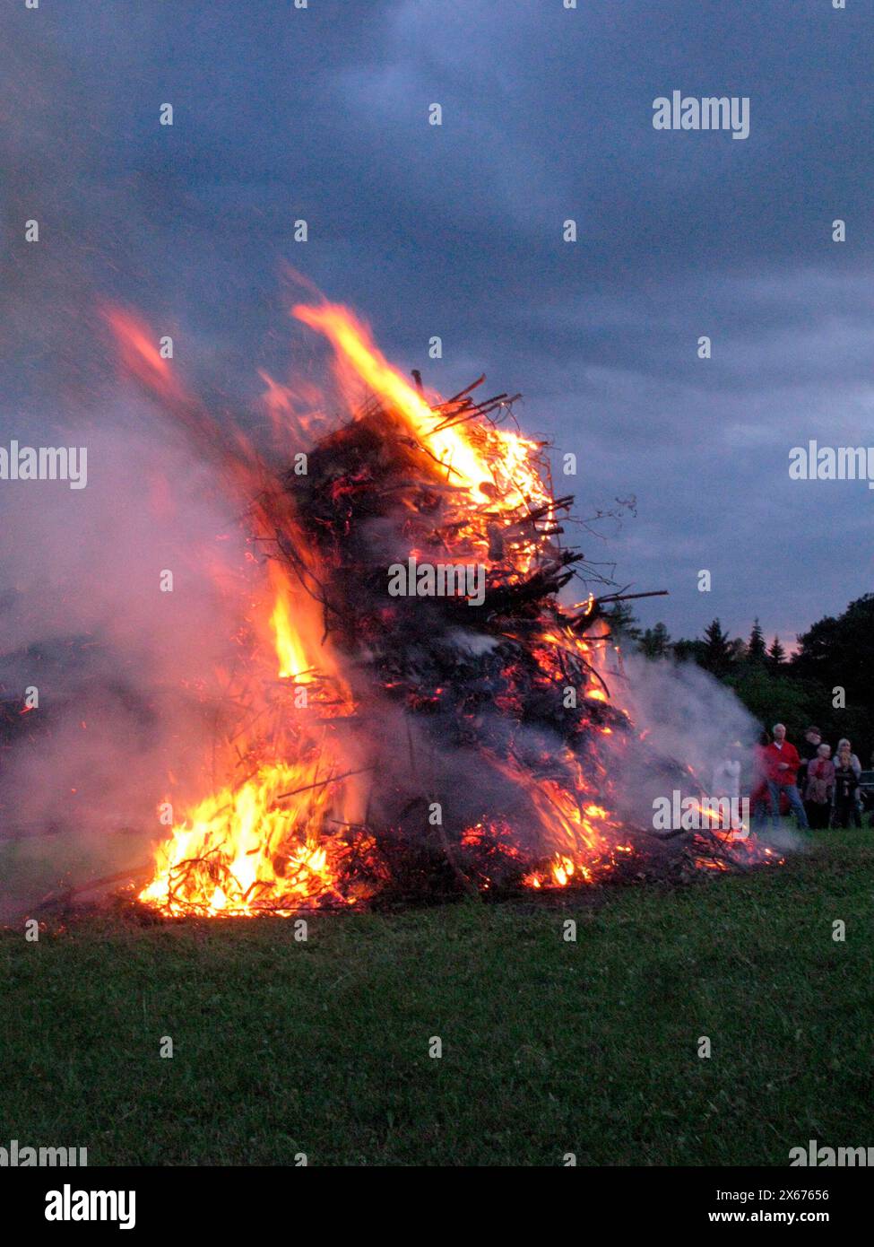 the flames of a burning fire as a heat source the flames of a fire ...