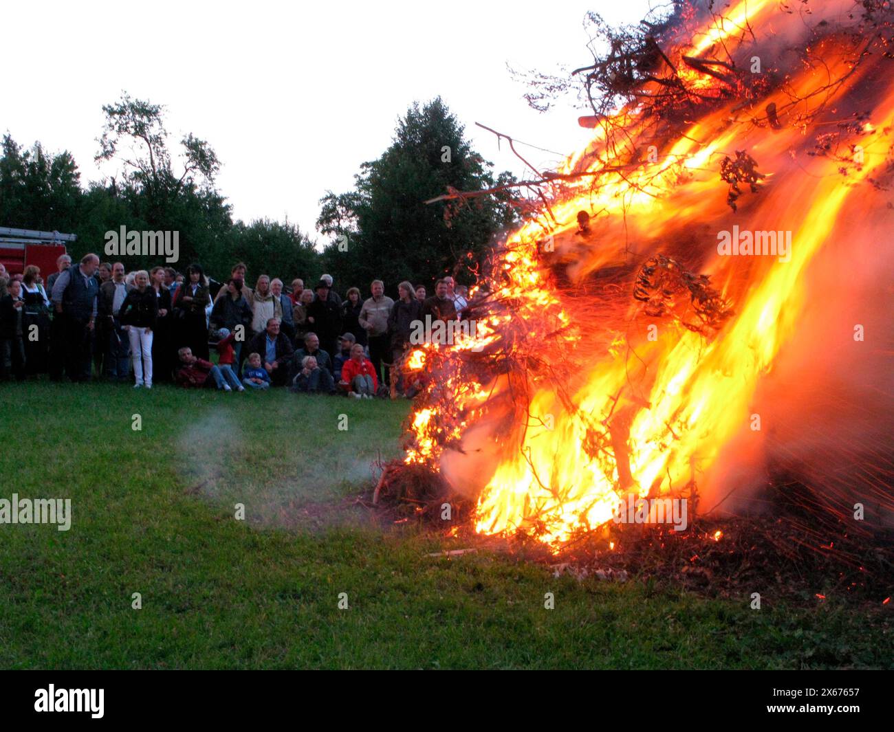 the flames of a burning fire as a heat source the flames of a fire ...