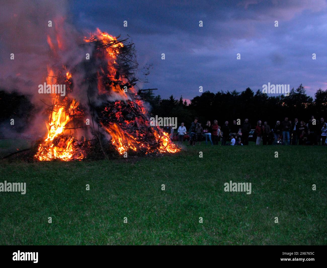 the flames of a burning fire as a heat source the flames of a fire ...