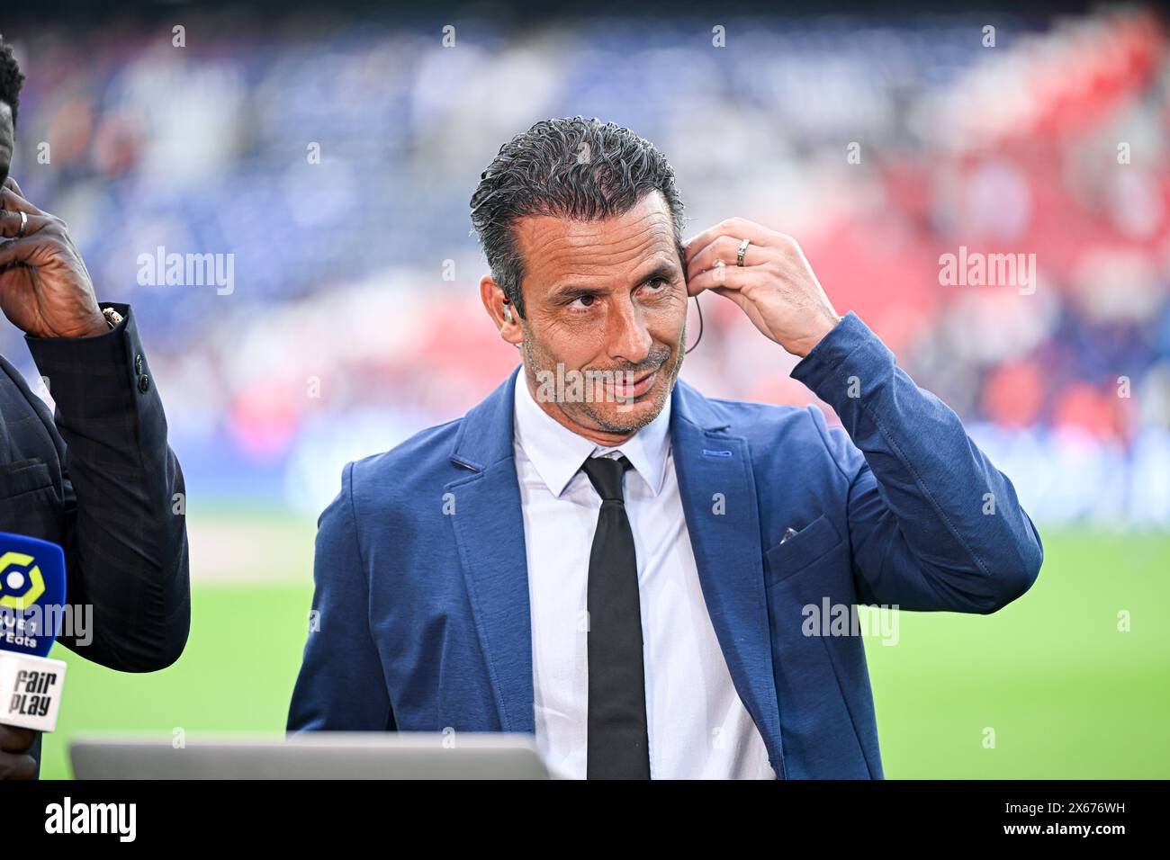 Paris, France. 12th May, 2024. Ludovic Giuly during the Ligue 1 ...