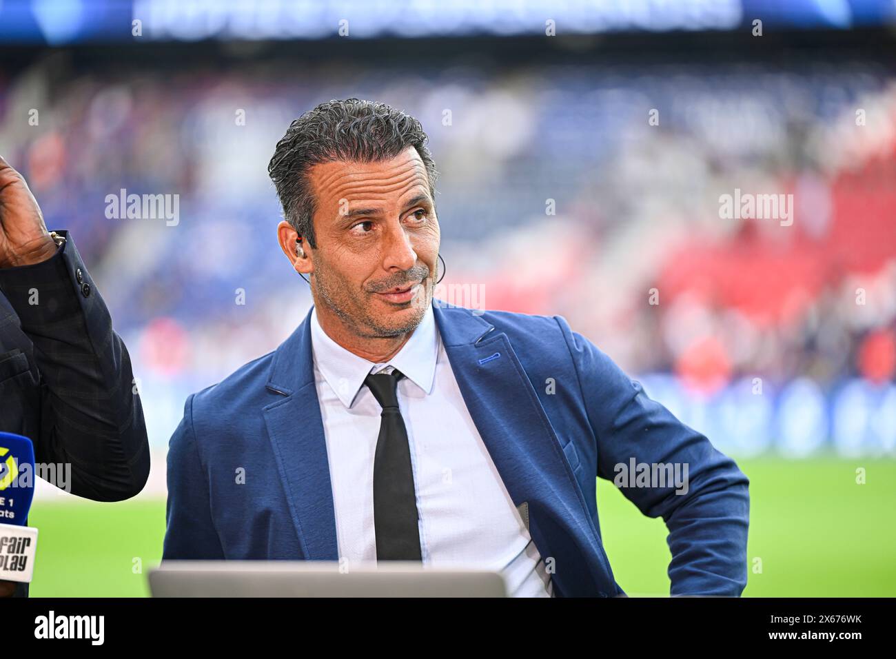 Paris, France. 12th May, 2024. Ludovic Giuly during the Ligue 1 ...