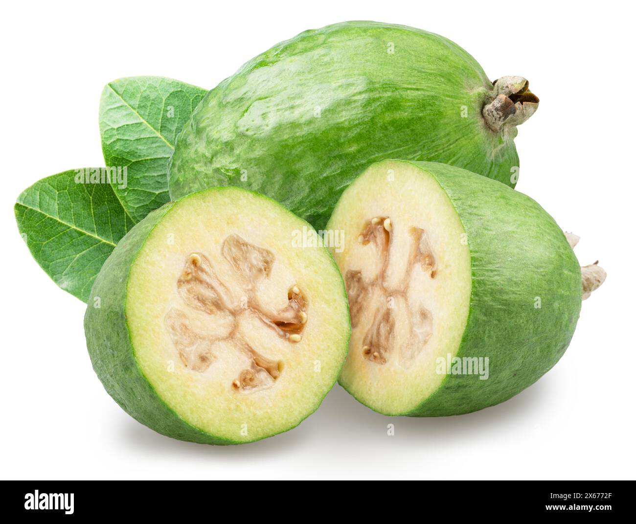Feijoa fruits with leaf and cross cuts of feijoa on white background ...