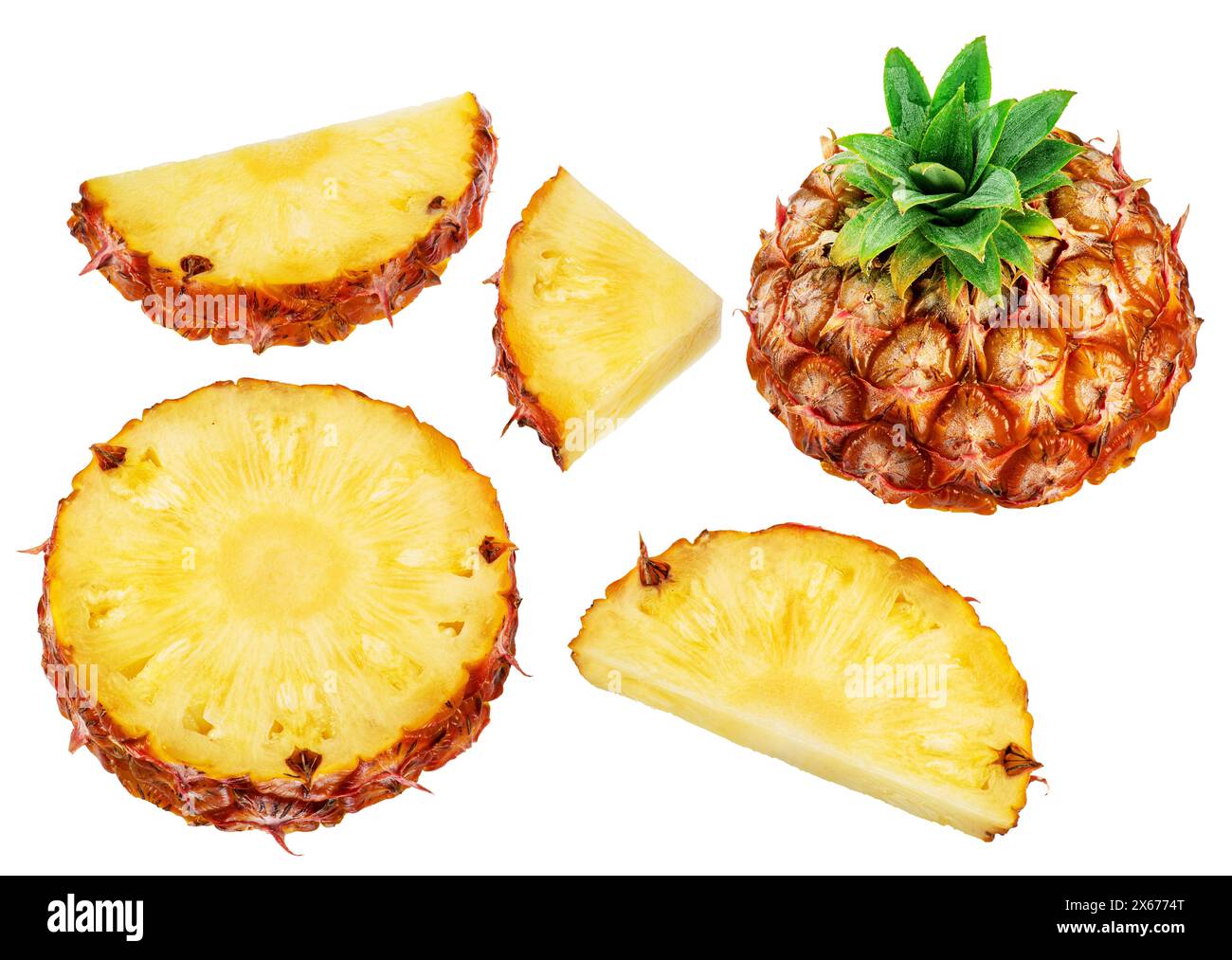 Ripe pineapple and pineapple slices isolated on white background. File ...