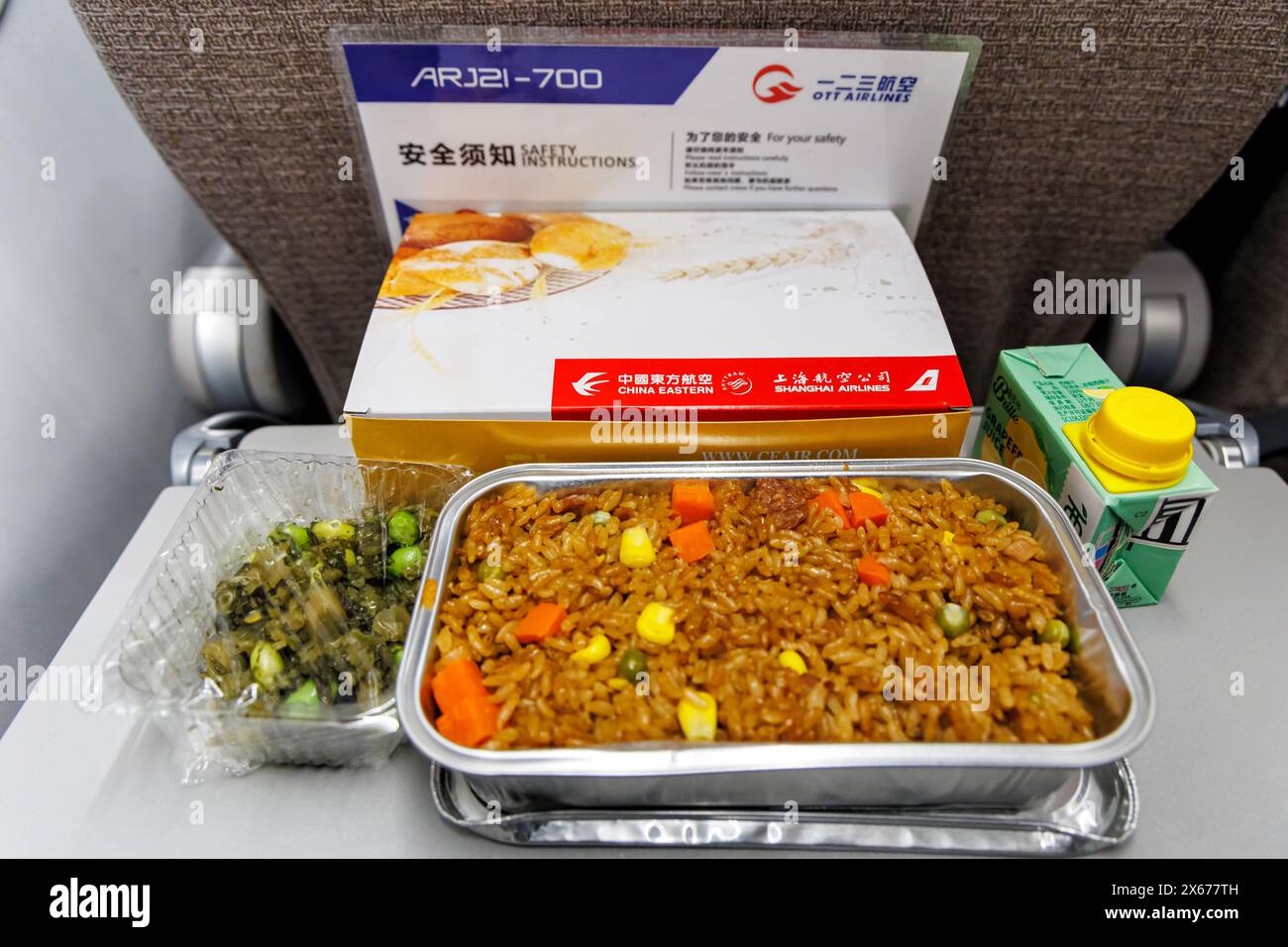 Shanghai, China - April 1, 2024: In-flight meal on board COMAC ARJ21 ...