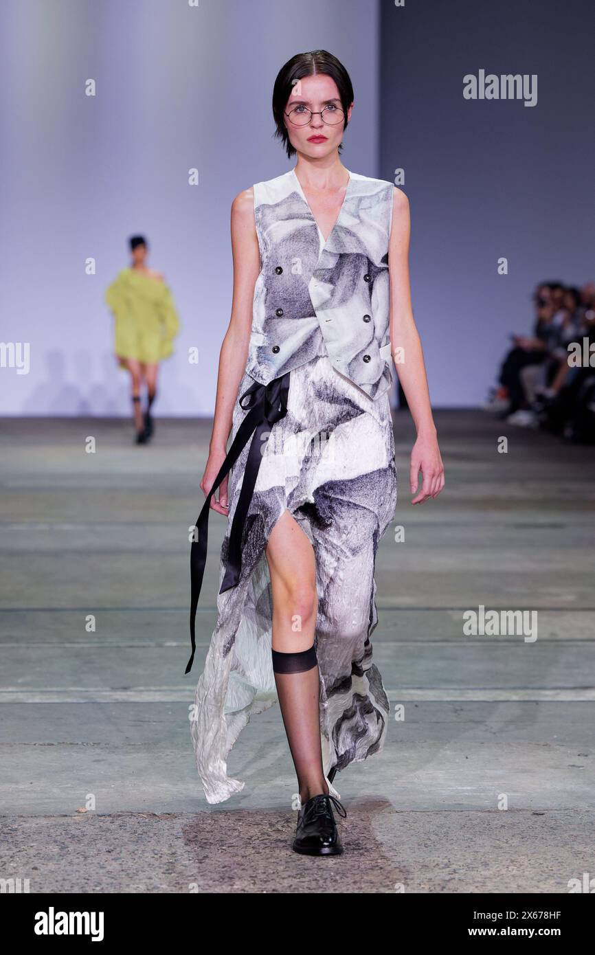 Sydney, Australia. 13th May, 2024. A model walks the runway during the ...