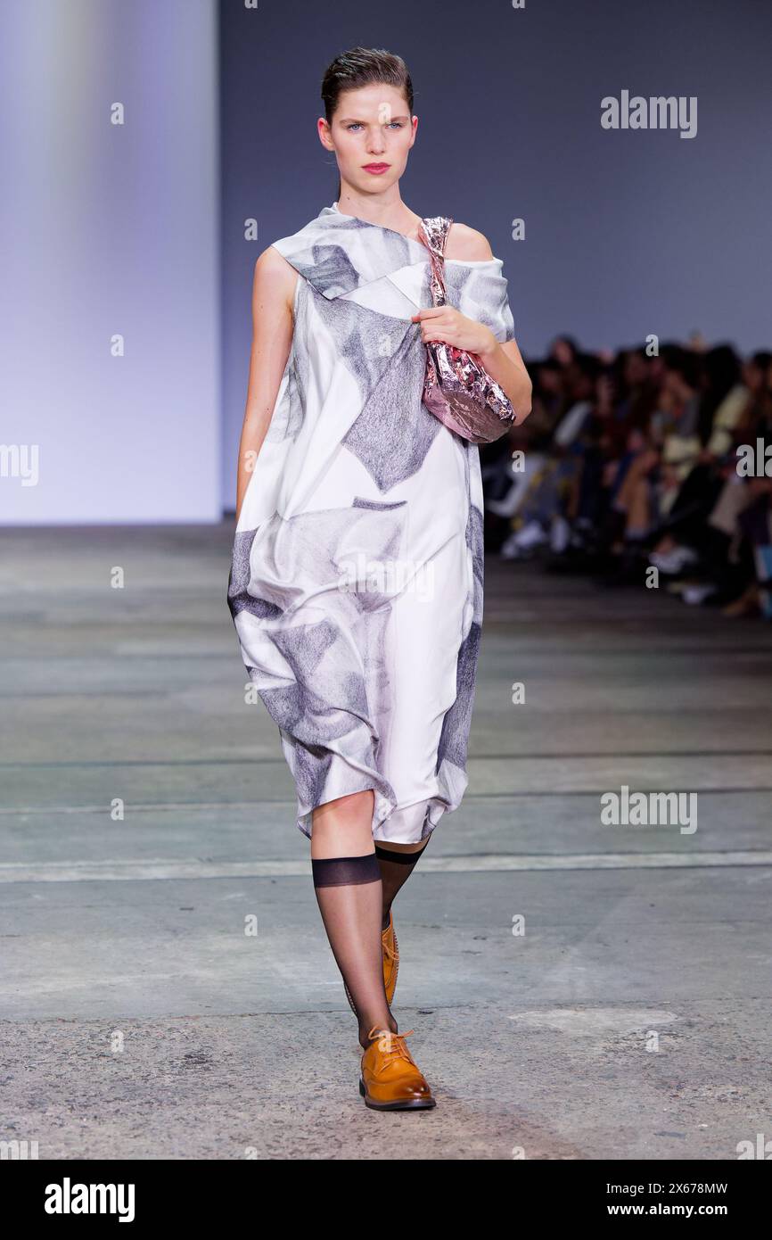 Sydney, Australia. 13th May, 2024. A model walks the runway during the ...