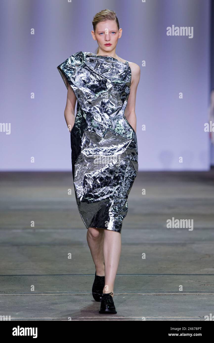 Sydney, Australia. 13th May, 2024. A model walks the runway during the ...