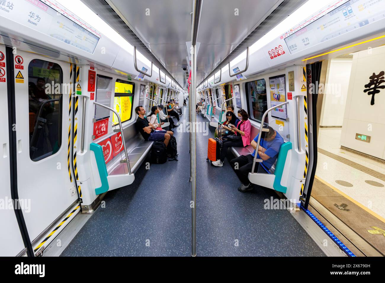 Shenzhen, China - April 4, 2024: Interior of a Metro train type A CRRC ...