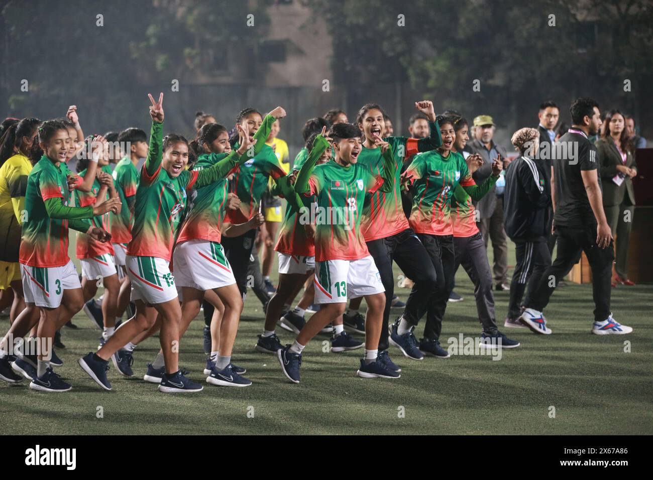 Bangladeshi players celebrate being joint champions with India following the SAFF Under-19 Women ...