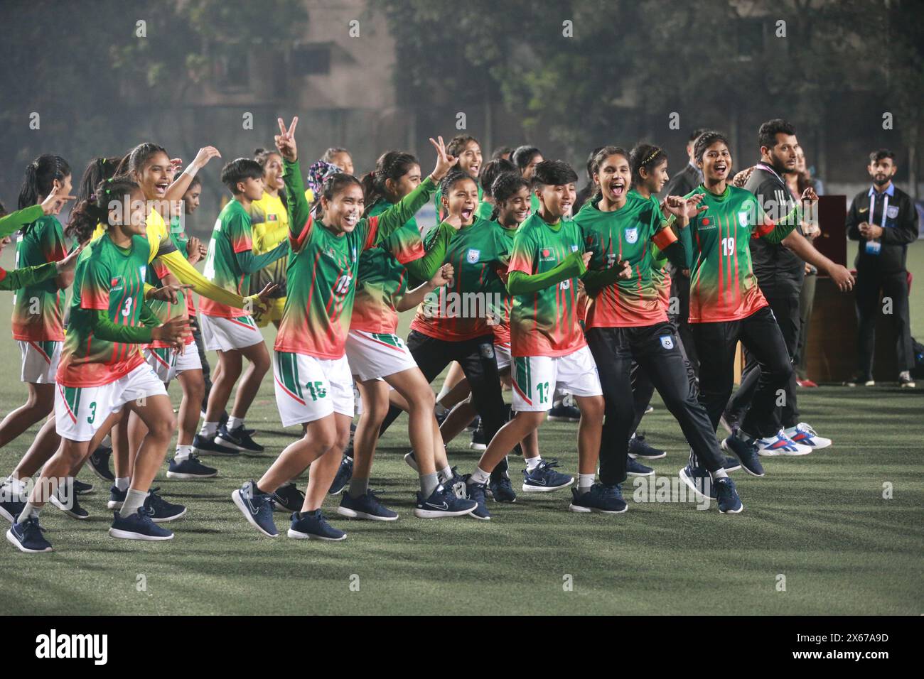 Bangladeshi players celebrate being joint champions with India following the SAFF Under-19 Women ...