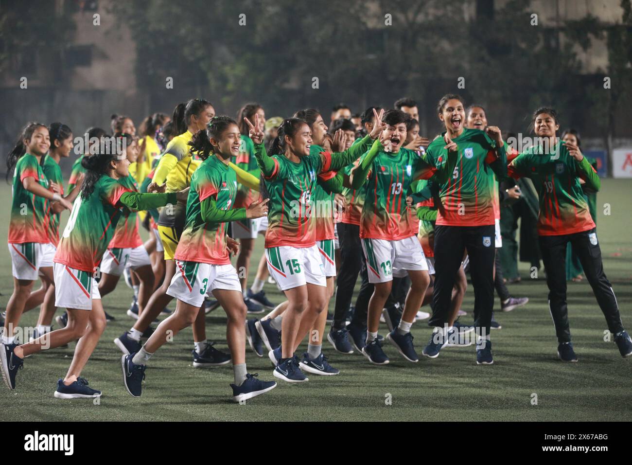 Bangladeshi players celebrate being joint champions with India following the SAFF Under-19 Women ...