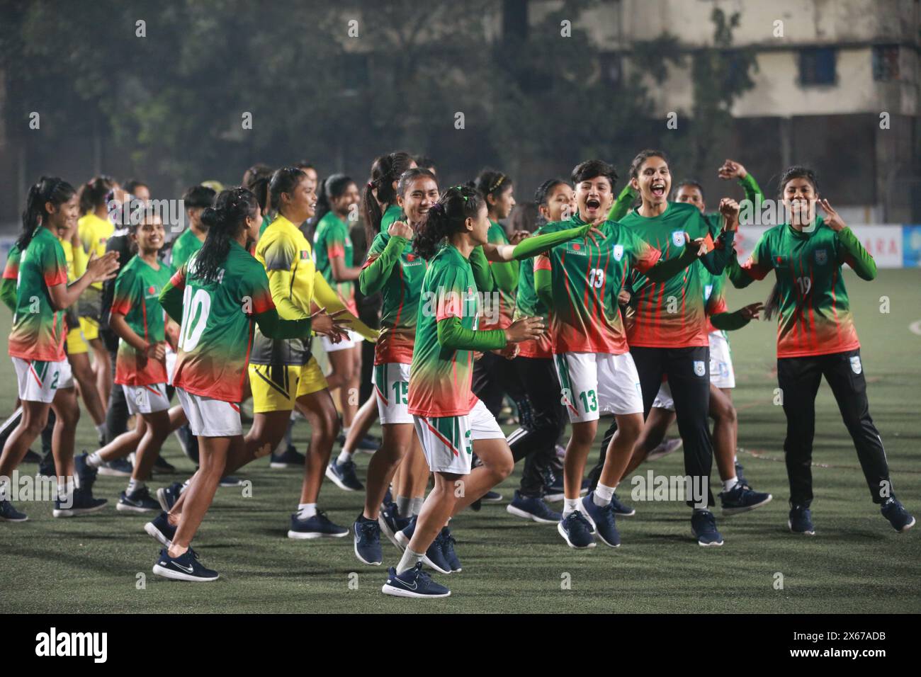 Bangladeshi players celebrate being joint champions with India following the SAFF Under-19 Women ...