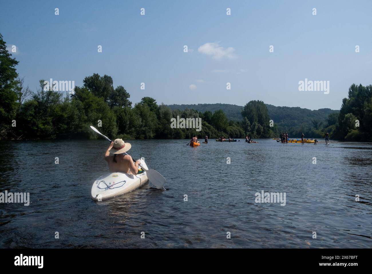 Nature outing in a canoe kayak boat on the Dordogne river during a ...