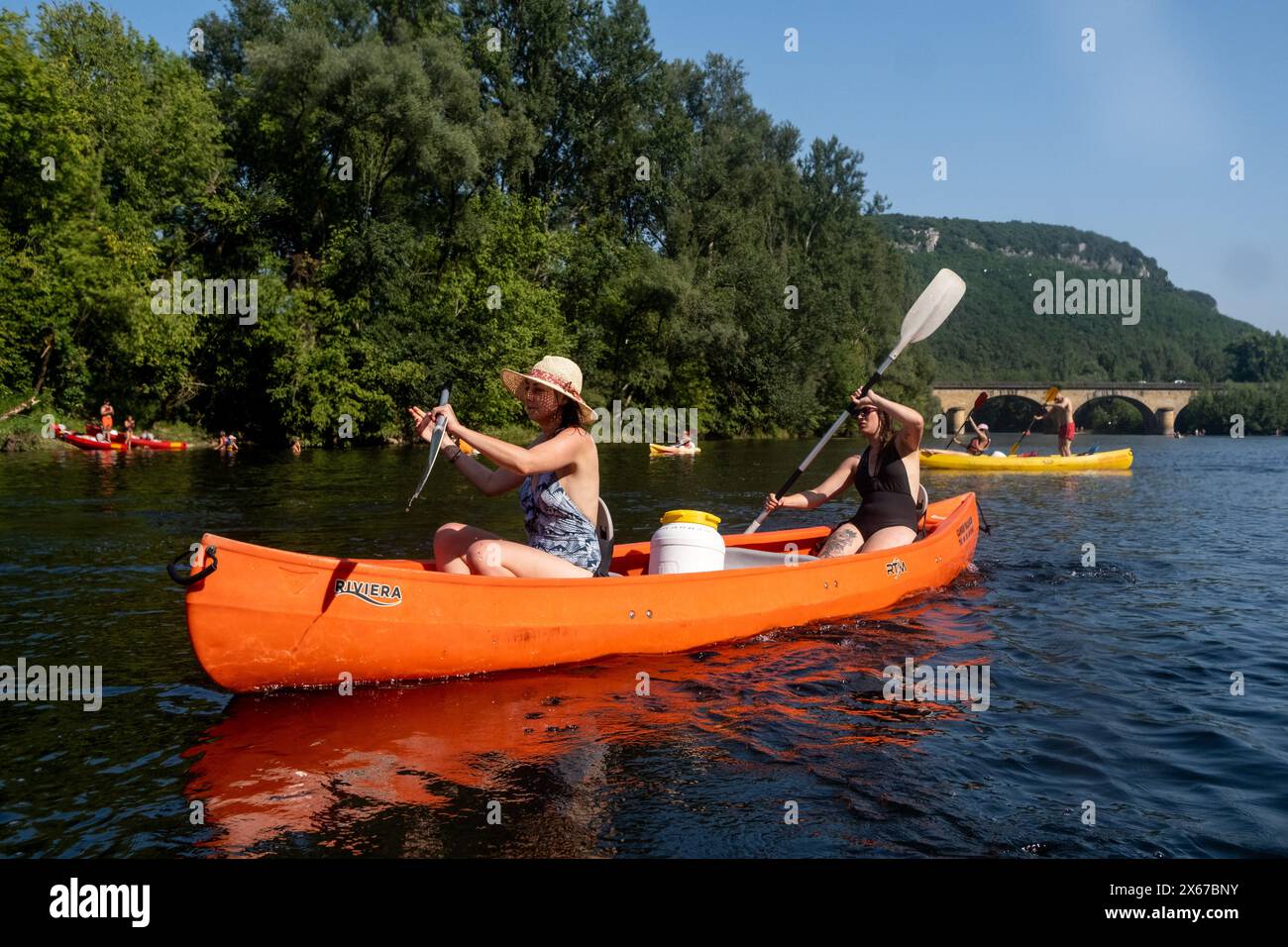 Nature outing in a canoe kayak boat on the Dordogne river during a ...