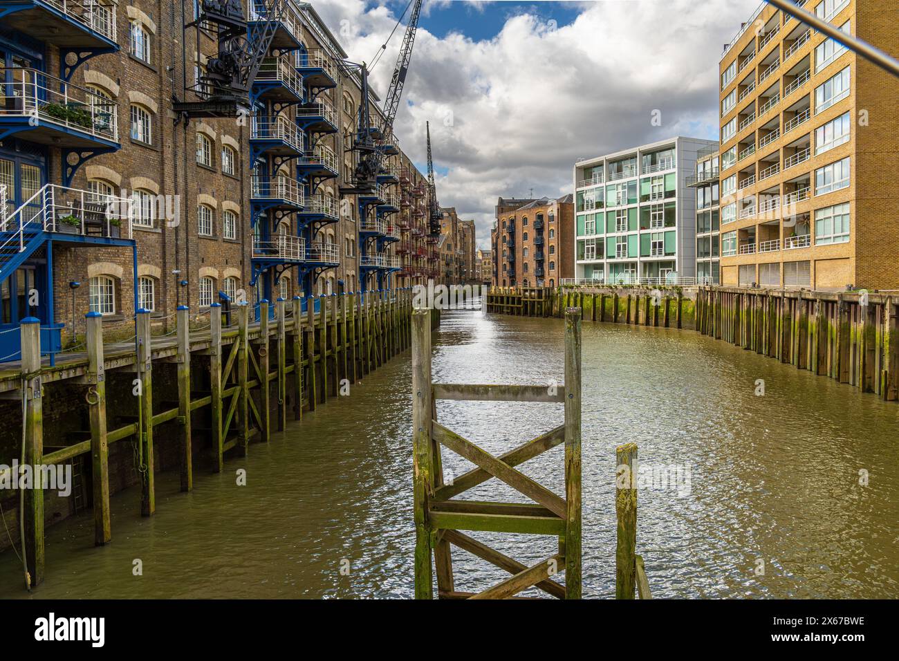 Old historic warehouse now converted into housing bordering the River ...