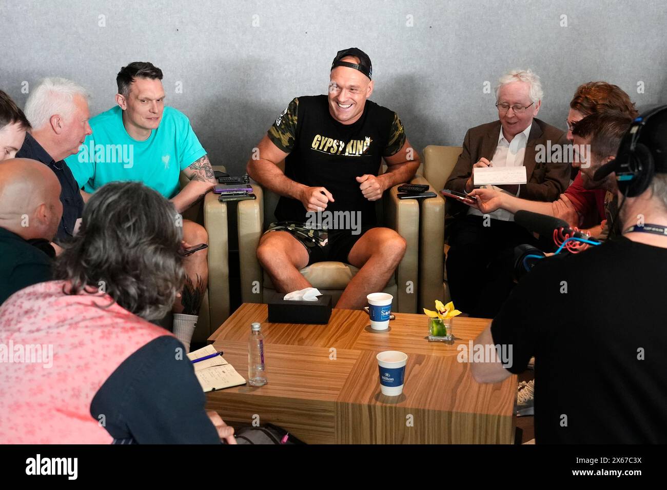 Boxer Tyson Fury (centre) during a media day in Riyadh. The IBF, WBA ...