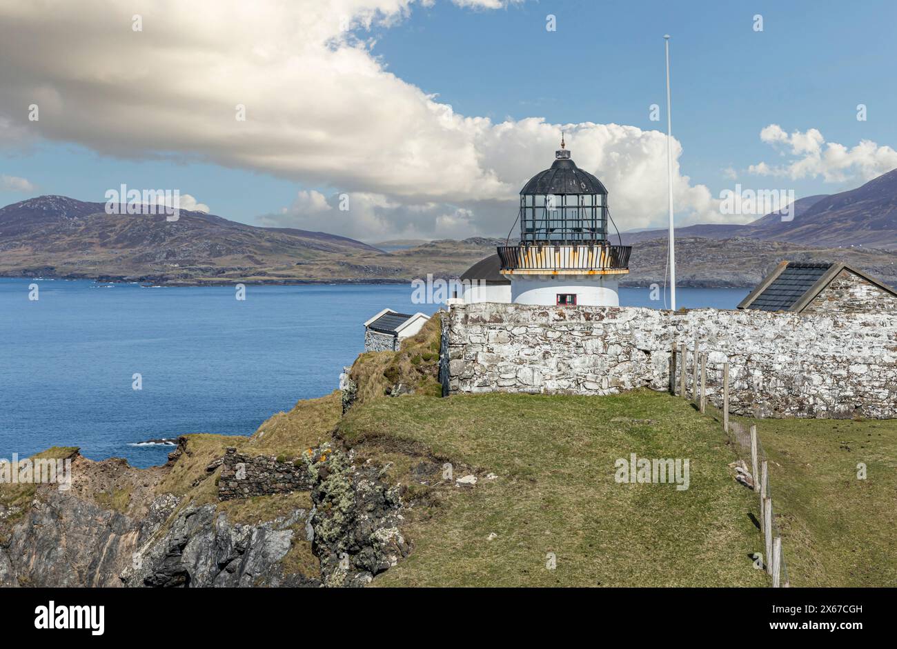 The top of a Lighthouse on the top of a cliff overlooking the sea Stock ...