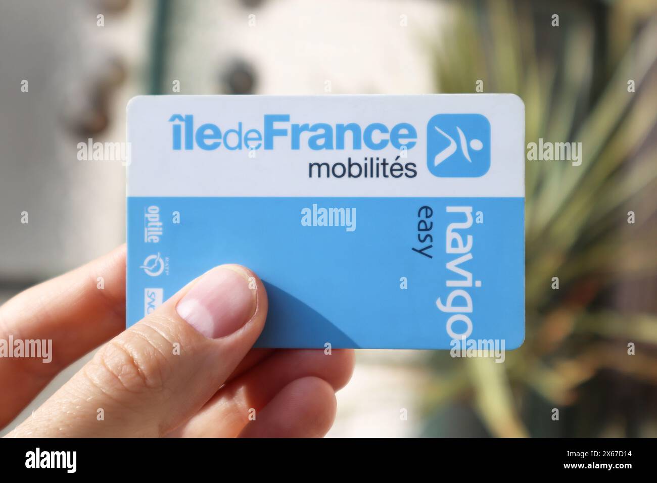 Nice, France - 11.05.2024: Man's hand holding Paris transport card ...
