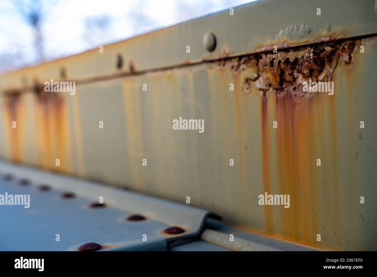 Rusted and peeling paint on an electrical transformer exposed to the ...