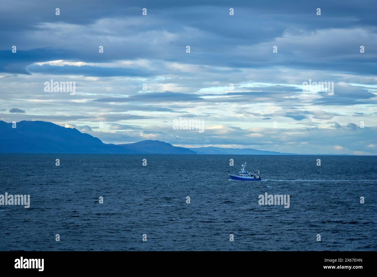 Fishing boat ride pass Island of Arran, Scotland Stock Photo - Alamy