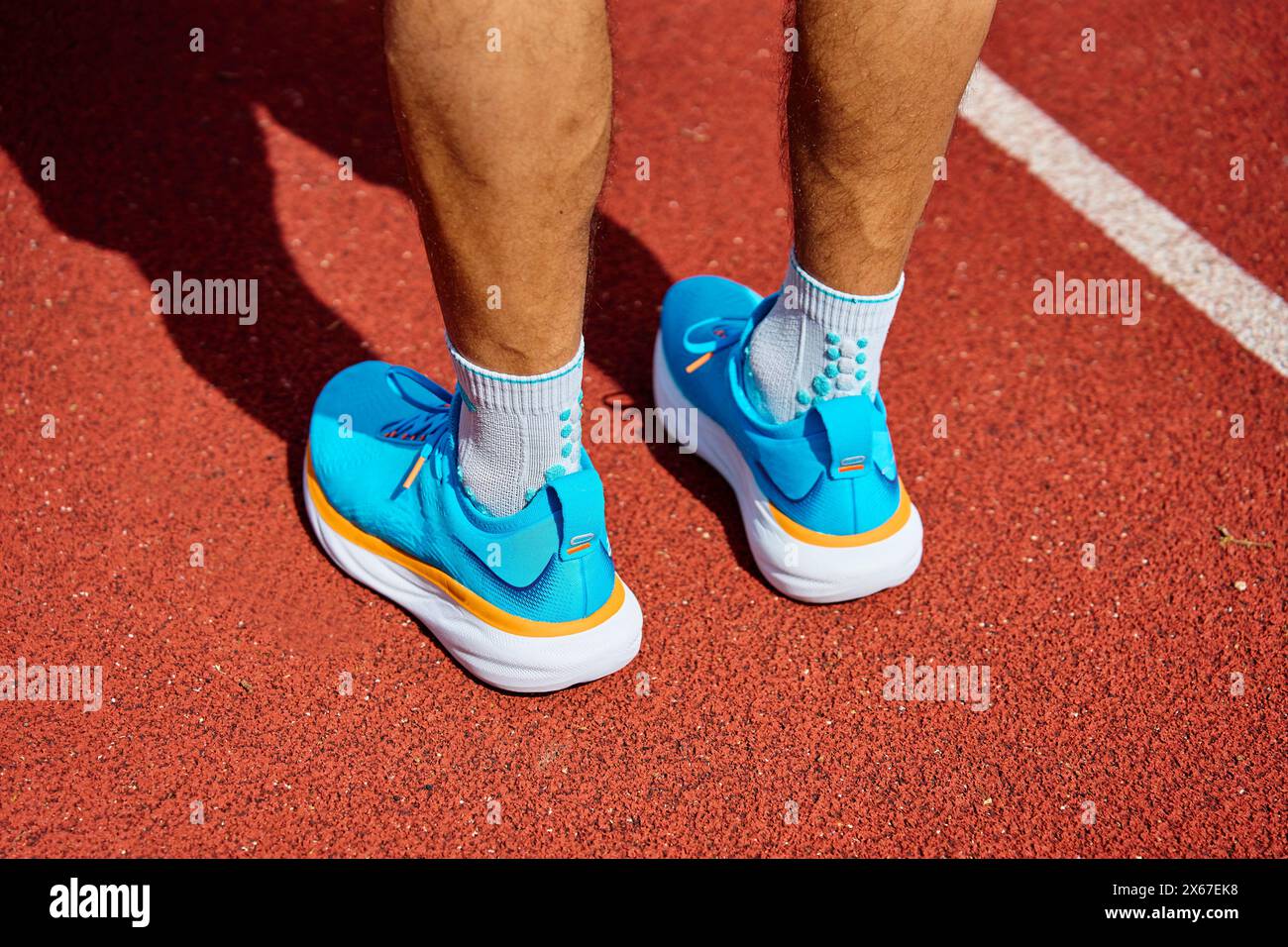 Athlete wearing sports shoes hi-res stock photography and images - Alamy