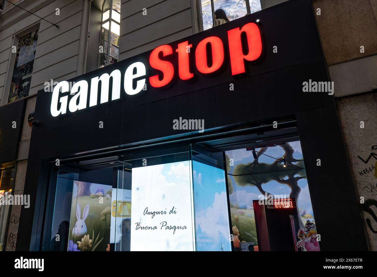 MILANO, ITALY - MARCH 30, 2024: Banner of GameStop retailer which is ...