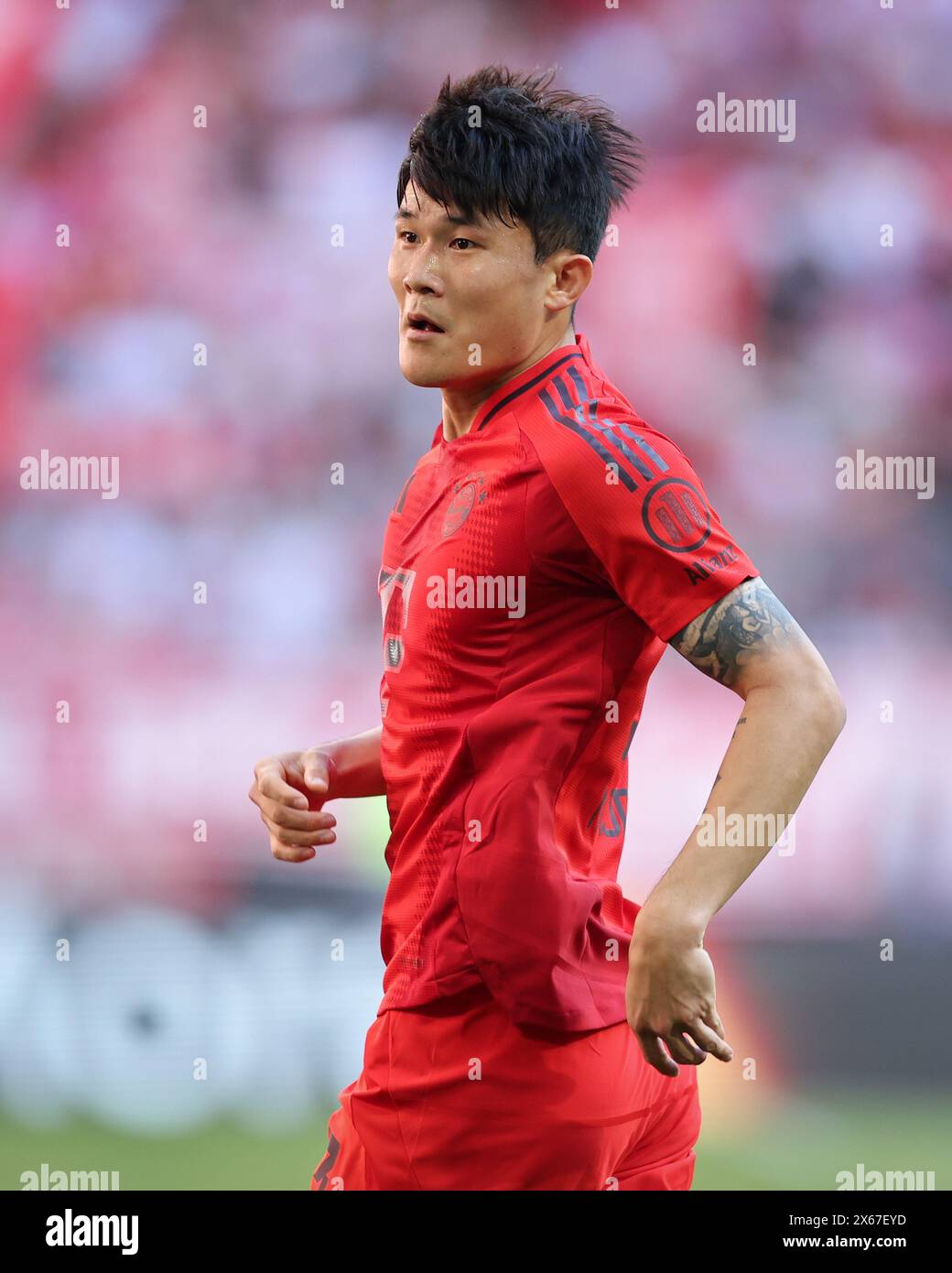 MUNICH, GERMANY - MAY 12: Min Jae Kim of FC Bayern Muenchen looks on ...