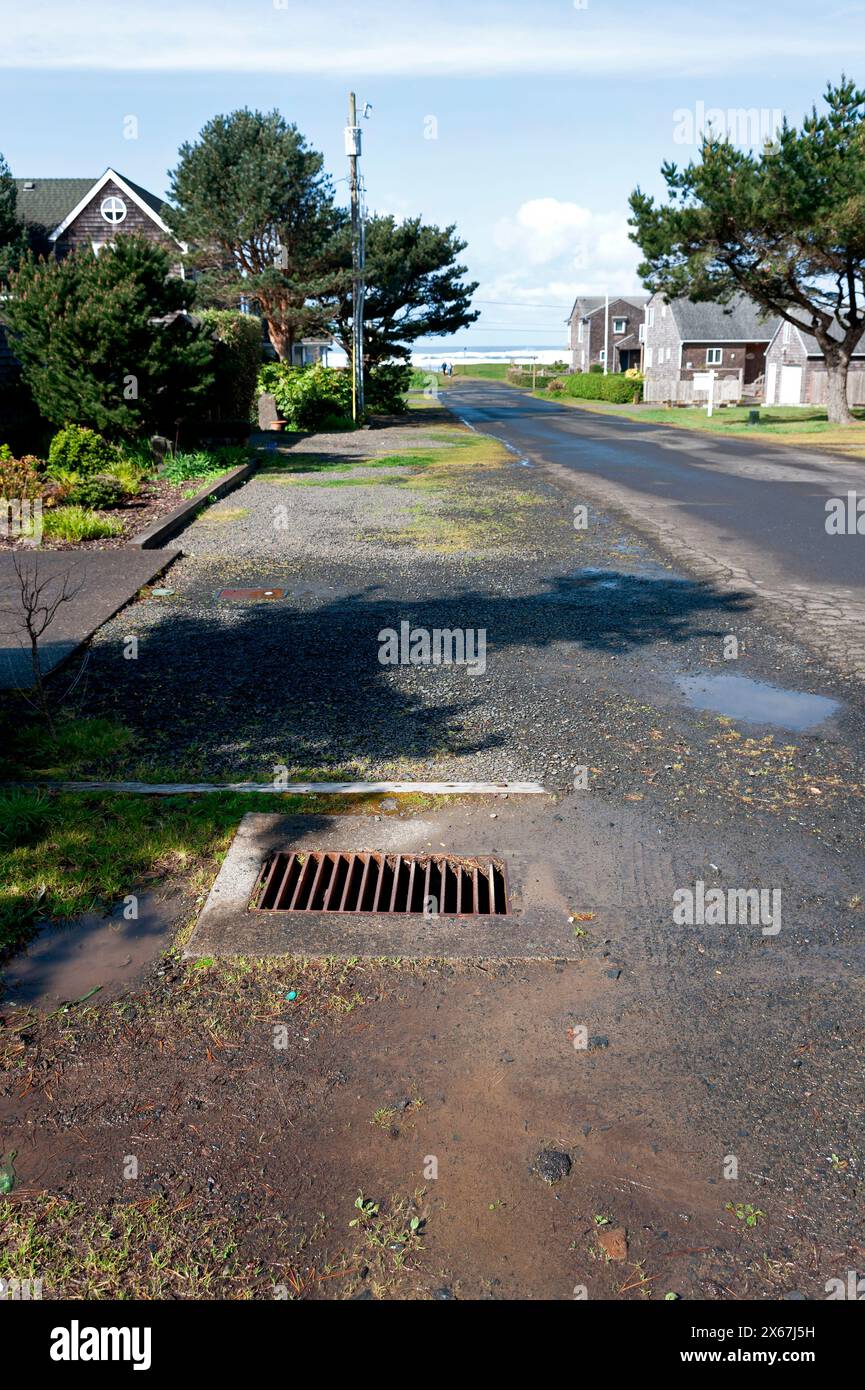 Storm drain on street hi-res stock photography and images - Alamy
