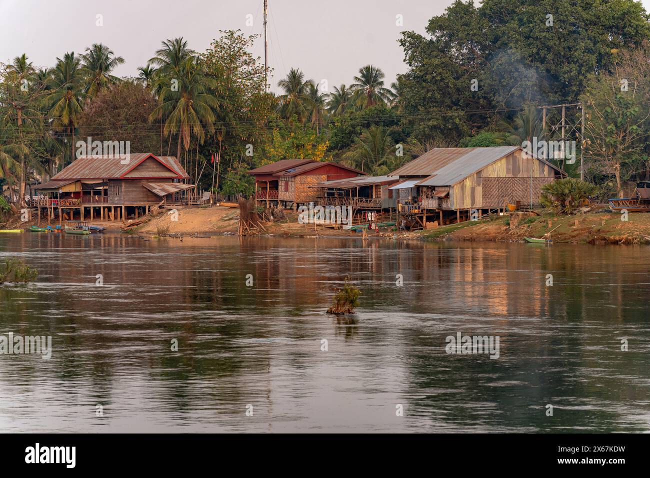 Stilt houses on the Mekong River on Don Khon Island, Si Phan Don ...