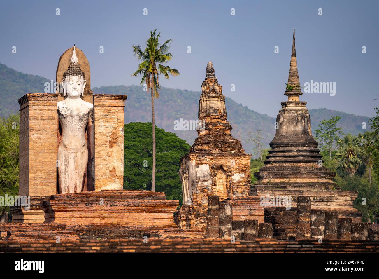 Giant standing Buddha in the Wat Mahathat temple in the UNESCO World ...