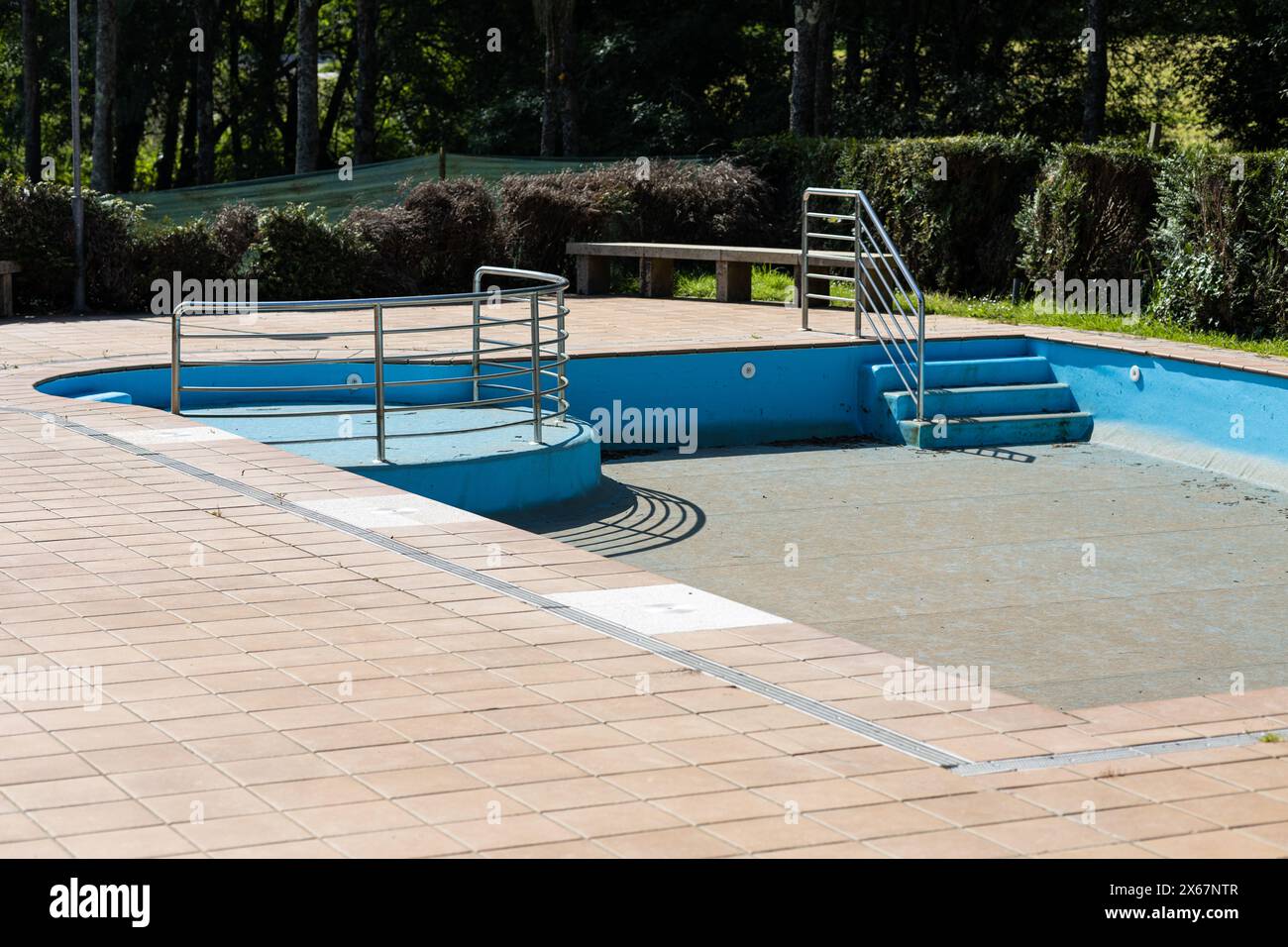 Empty swimming pool. Concept of drought and water scarcity Stock Photo ...