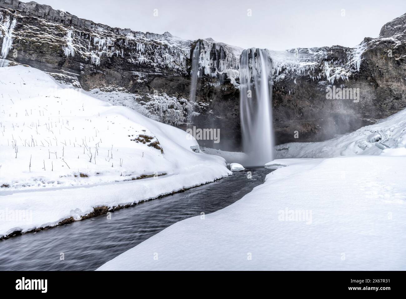 The Seljalandsfoss waterfall in winter in South Iceland Stock Photo - Alamy