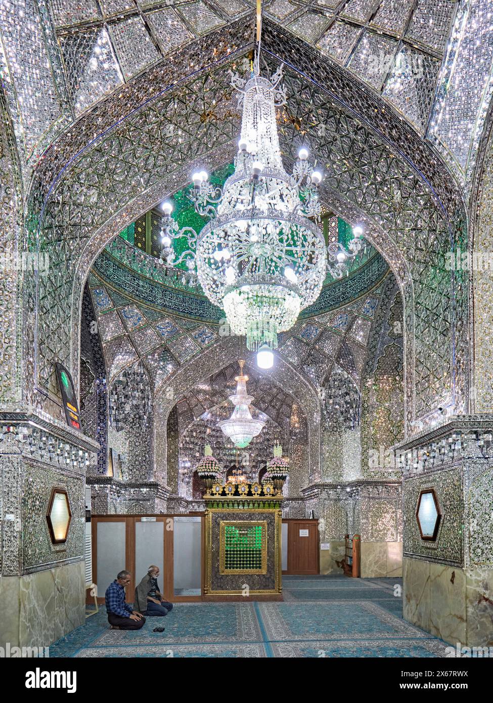 Men pray in the Ali Ibn Hamzeh Holy Shrine elaborately decorated inside ...