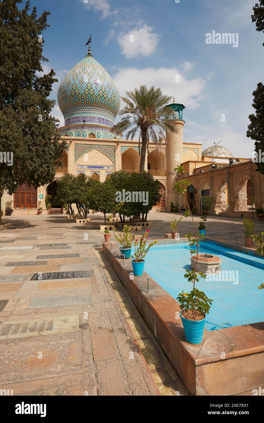 Courtyard of Ali Ibn Hamzeh Holy Shrine with a water pool. Shiraz, Iran ...