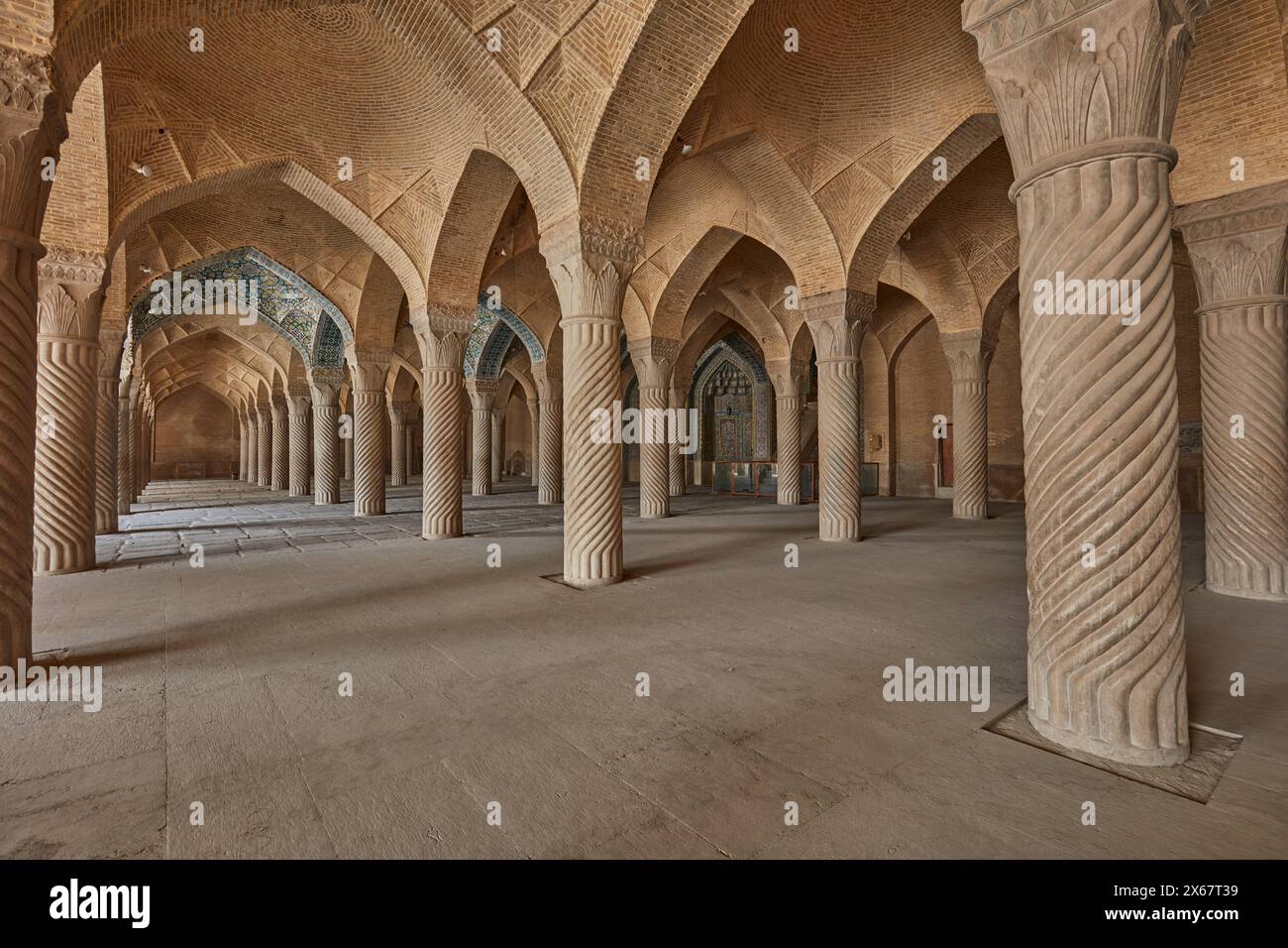 Interior view of central prayer hall with many pillars supporting roof of brick vaults in the ...