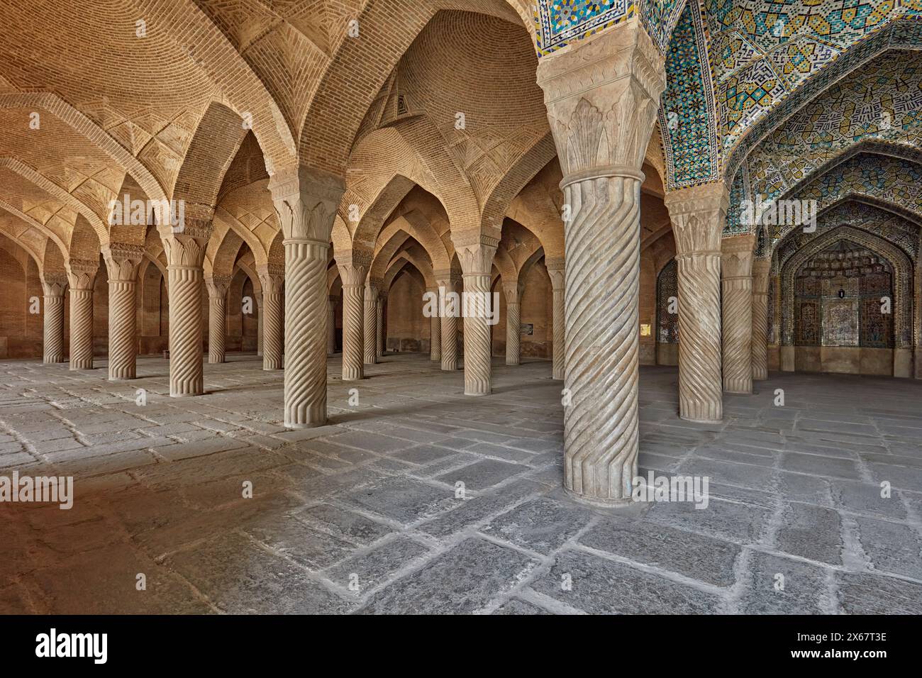 Interior view of central prayer hall with many pillars supporting roof ...