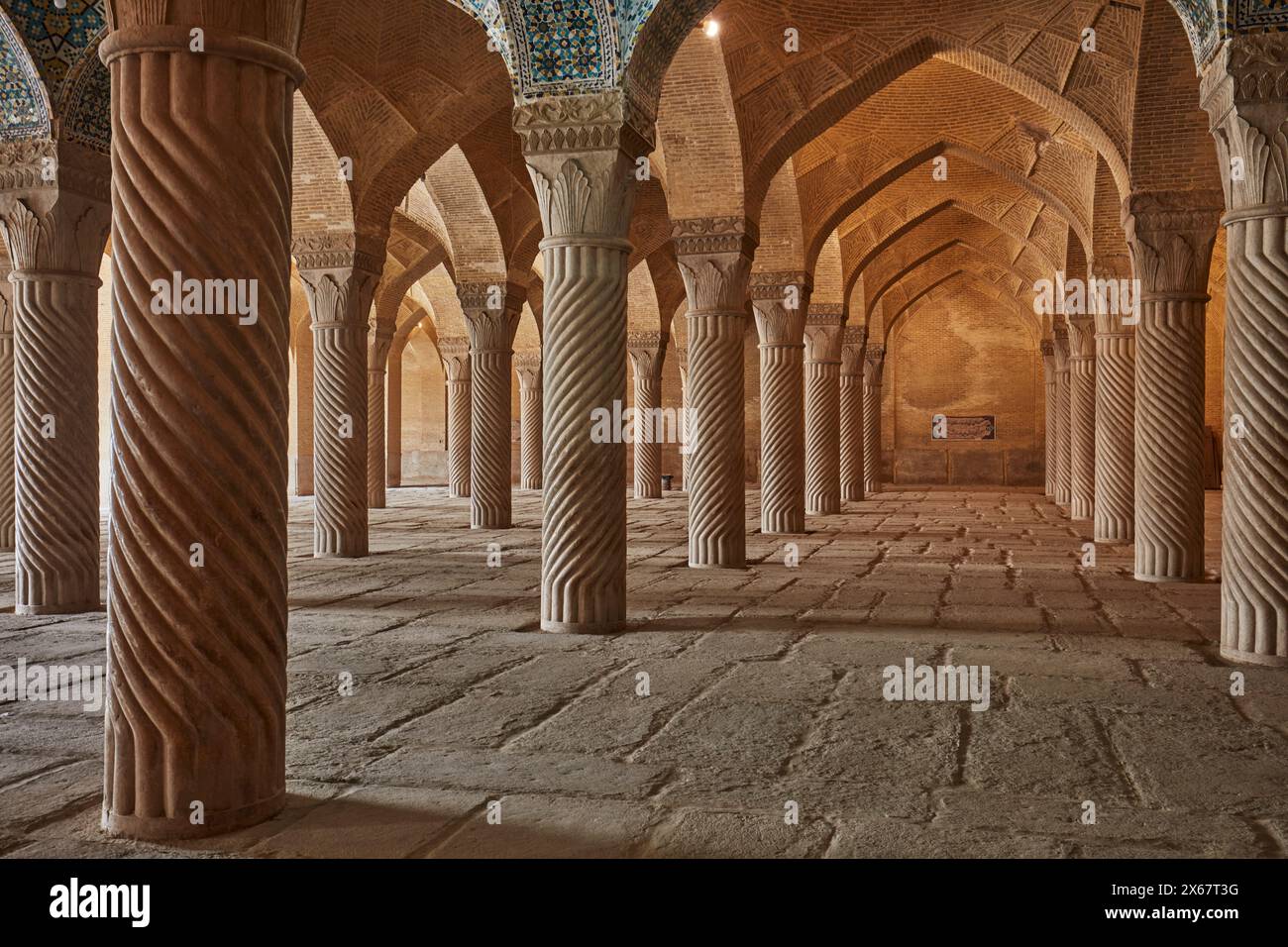 Interior view of central prayer hall with many pillars supporting roof ...
