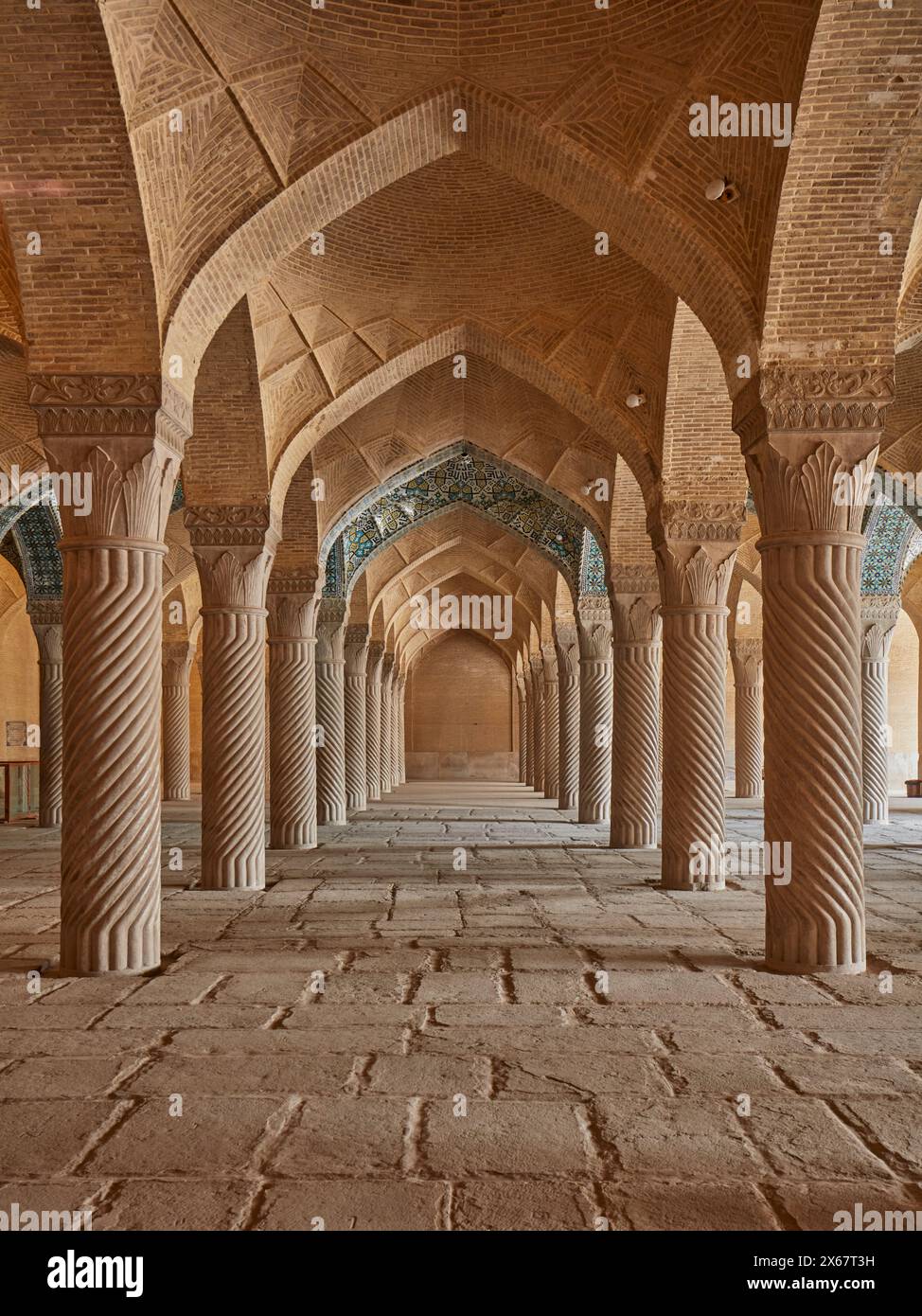 Interior view of central prayer hall with many pillars supporting roof ...